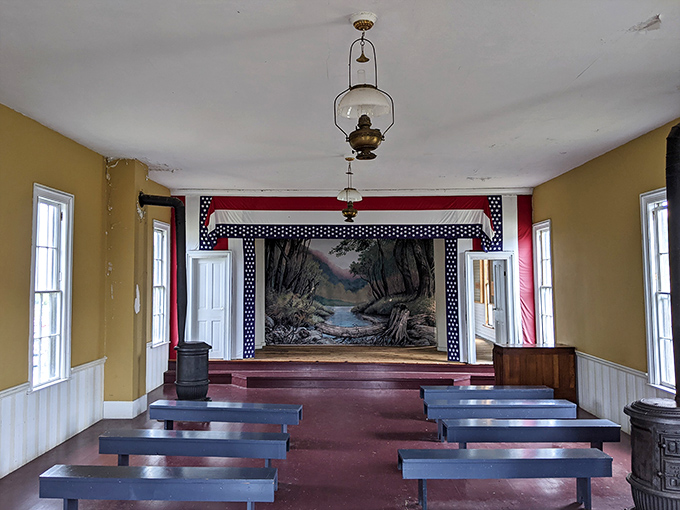 Lights, camera, 19th century action! This cozy interior looks like it's waiting for its close-up in a period drama. Mr. Darcy, is that you?