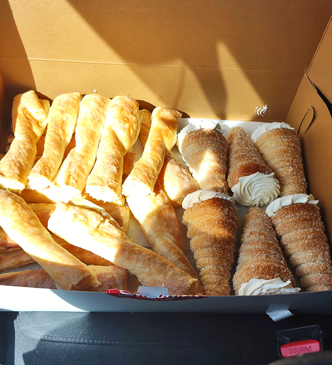 Ladies and gentlemen, introducing the Lady Horns! These cream-filled delights are dressed to impress and ready to steal the show.