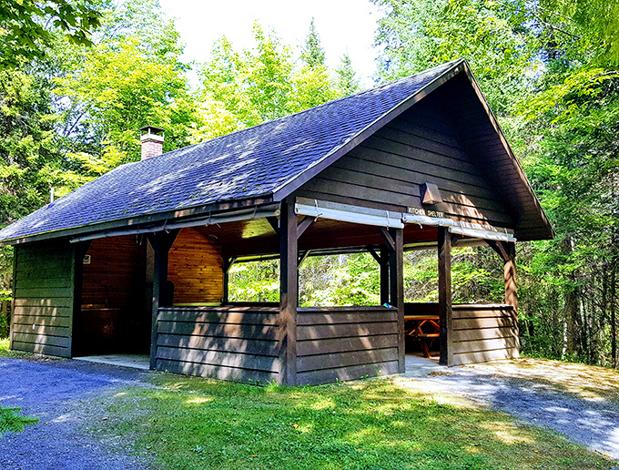 Rustic charm meets cozy comfort. This picnic shelter is the log cabin of your dreams, minus the bears and splinters.