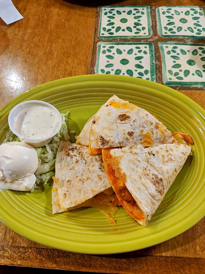 Quesadillas: The unsung hero of comfort food. This golden disc of cheesy bliss is like a warm hug for your taste buds.