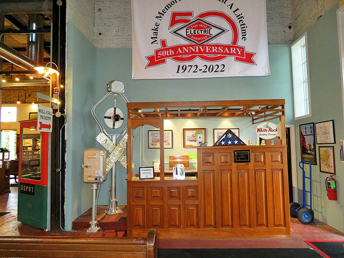 Welcome to rail fan paradise! This 50th anniversary banner hints at decades of preserving history, one track at a time.