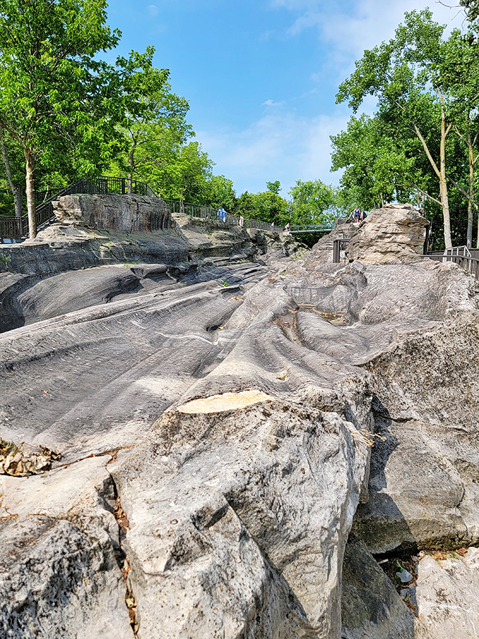 "Mother Nature's sculpture garden: No admission fee required." The Glacial Grooves showcase Earth's artistic side, a reminder that the best artists work in millennia, not minutes.