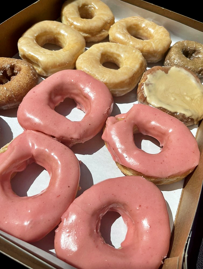 Pretty in pink and ready to party! These strawberry-glazed donuts are like the prom queens of the pastry world - sweet, popular, and impossible to resist.
