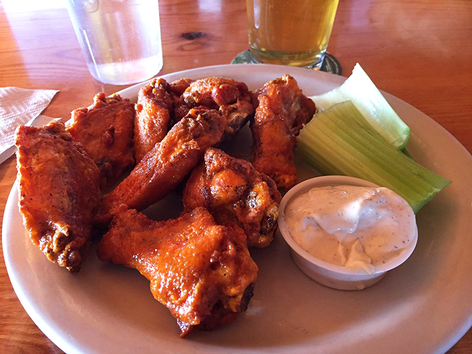 Wings so good, they'll make you forget your table manners. Napkins are strongly advised, dignity is optional.