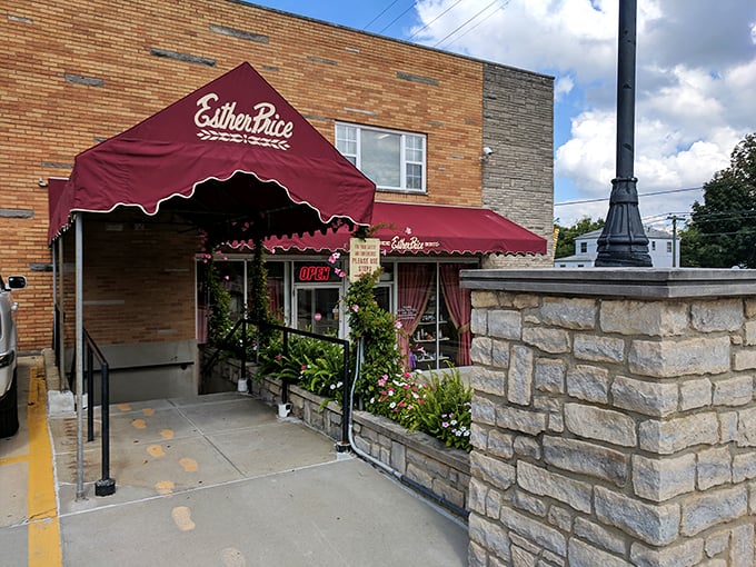 Esther Price: Proving since 1926 that burgundy and chocolate are a match made in heaven! This storefront is like a warm hug for your sweet tooth.