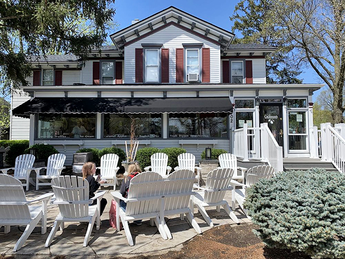 White picket fence? Check. Rocking chairs? Check. Heavenly chocolates? Double check! It's like Main Street USA, but with a sugar high.
