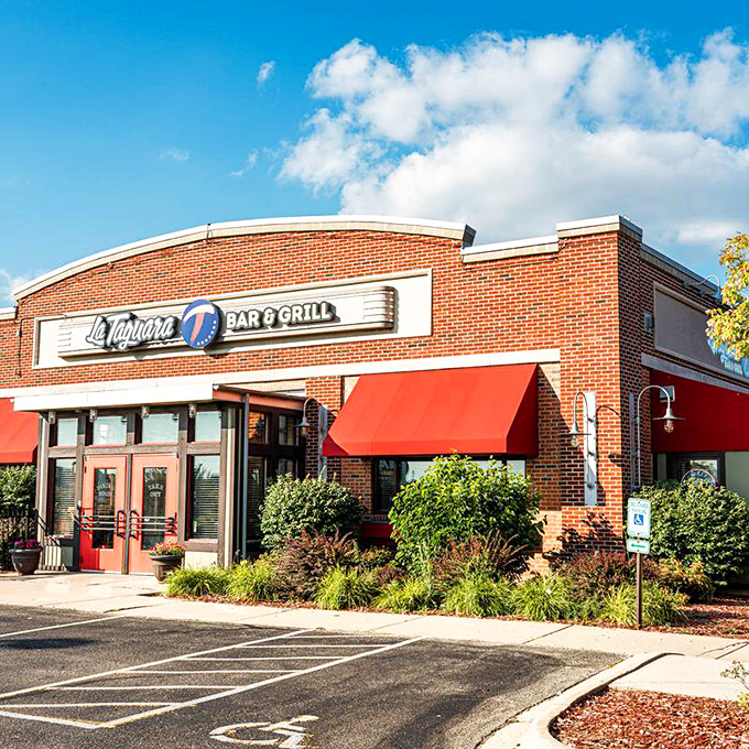 La Taguara: Where Cuban meets comfort! This inviting brick exterior hints at the warm welcome waiting inside.