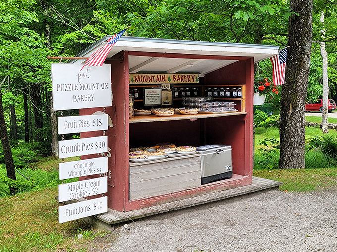 Puzzle Mountain Bakery: Pie perfection on the honor system! This tiny red shed holds big flavors and even bigger trust in humanity.