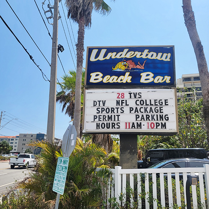Undertow's sign: A neon beacon for beach bums and cocktail aficionados alike. Island time starts here, leave your worries at the door.