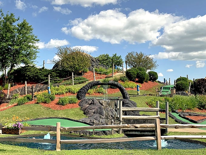 Volcano Falls: Where 'lava' is just a fancy word for water. This erupting centerpiece adds sizzle to your swing!