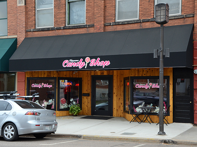 Neon lights, candy delights! The Chippewa Candy Shop glows brighter than Rudolph's nose, guiding sugar lovers home.