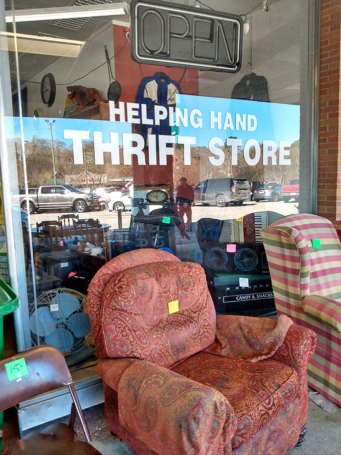 Window shopping just got interesting! From paisley armchairs to polka-dot teapots, this thrift store window is a time-traveling peepshow of style.