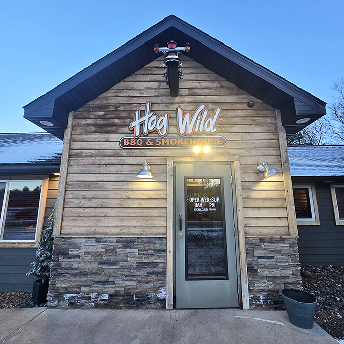 Hog Wild's wooden facade is like a smoky time machine, transporting you to BBQ nirvana. Don't forget to set your watch to 'meat o'clock'!