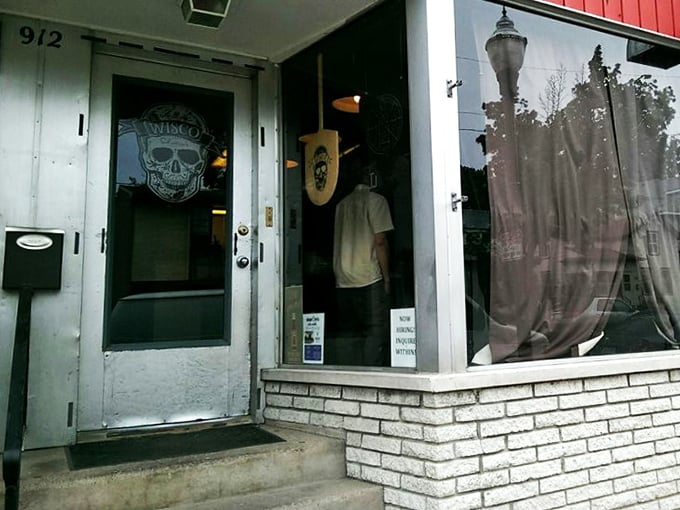 Red awning, green light for deliciousness! Salvatore's understated exterior is like a secret handshake for pizza lovers in the know.