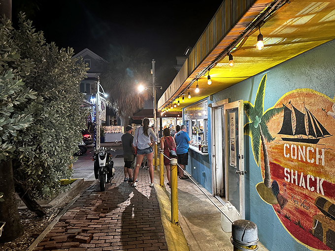 Blue exterior, red lobster, golden fritters. The Conch Shack is serving up a delicious color palette!