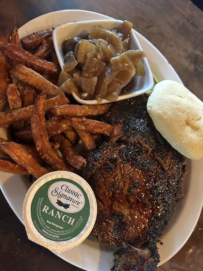 A 16oz ribeye with sweet potato fries? It's like the culinary equivalent of a bear hug from your favorite aunt.