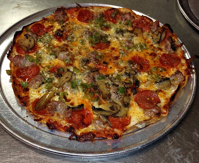 The catch of the day! This anchovy-topped pizza is so fresh, you'll swear you can hear seagulls in the distance.