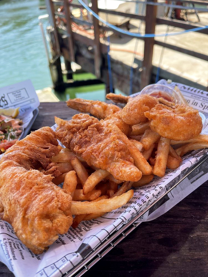 The catch of the day, served with a side of crispy happiness. These fish and chips are so good, they might just have you speaking with a British accent.