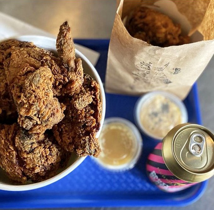 Fried chicken so good, it might just cure your misery. These golden-brown beauties are served with a side of pure, crispy joy.