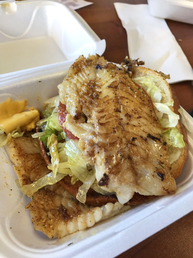 The "best grouper sandwich in town" isn't just a claim—it's a crispy, flaky promise that'll have you hooked at first bite.