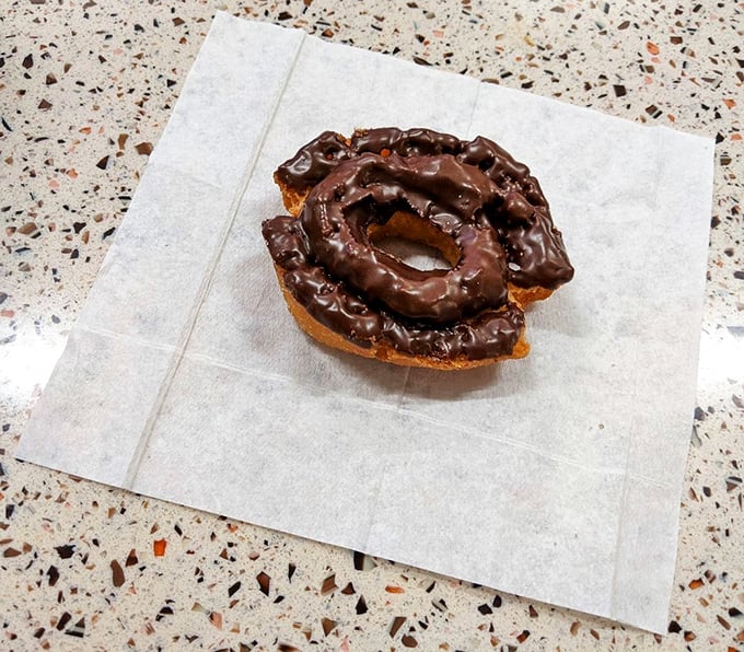 Chocolate lovers, rejoice! This buttermilk beauty is dressed in a glossy coat that would make even Willy Wonka jealous.