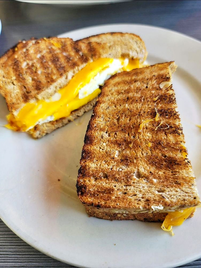 The Deluxe Egg Sandwich: where bread meets its destiny. It's not just a sandwich; it's a handheld breakfast revolution.