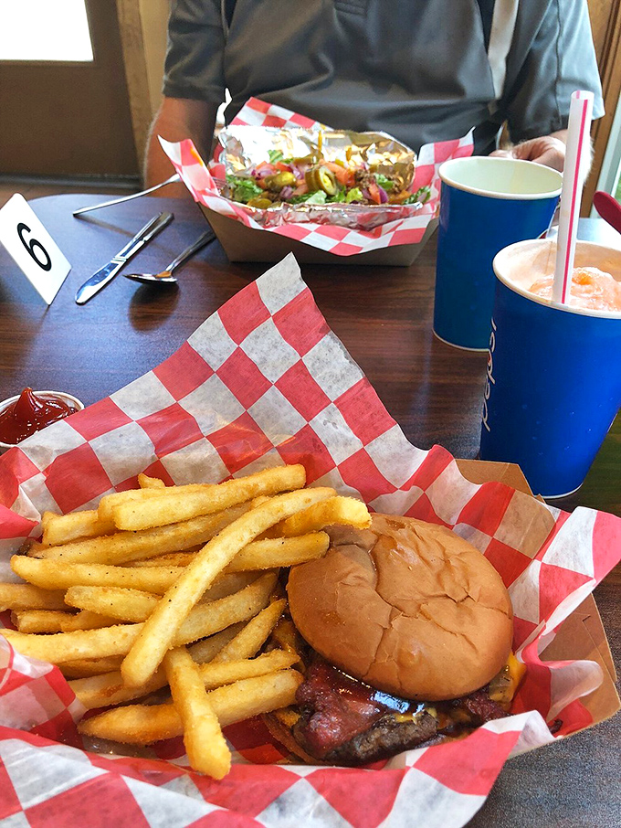 Comfort food with a view: nothing beats a classic burger and fries when you're embracing your inner outdoorsman.