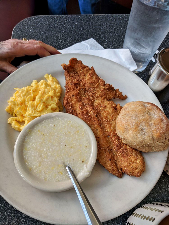 This isn't just breakfast; it's a Southern sunrise on a plate. Grits so creamy, they'd make a cloud jealous.