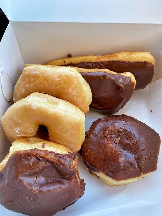 The dynamic duo of donuts! Glazed and chocolate-frosted, living together in perfect harmony. It's a tasty yin and yang.