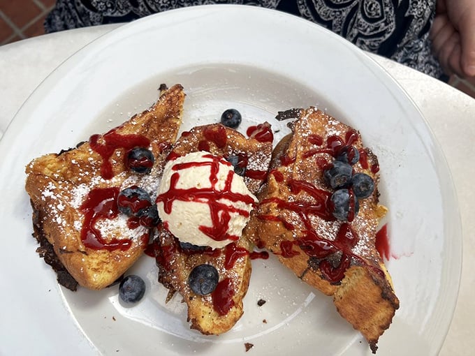 Lemon Ricotta French Toast: Where citrus zing meets creamy dream. It's like sunshine decided to take a nap on your plate.