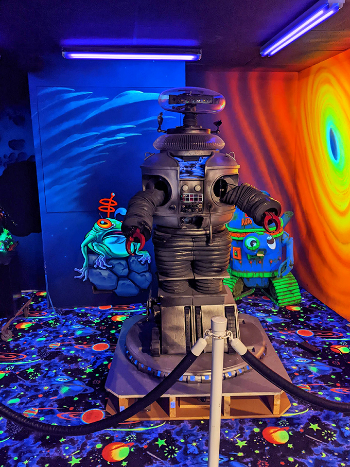 "Danger, Will Robinson!" This retro robot looks like it's ready to compute your score or serve up some interplanetary snacks.