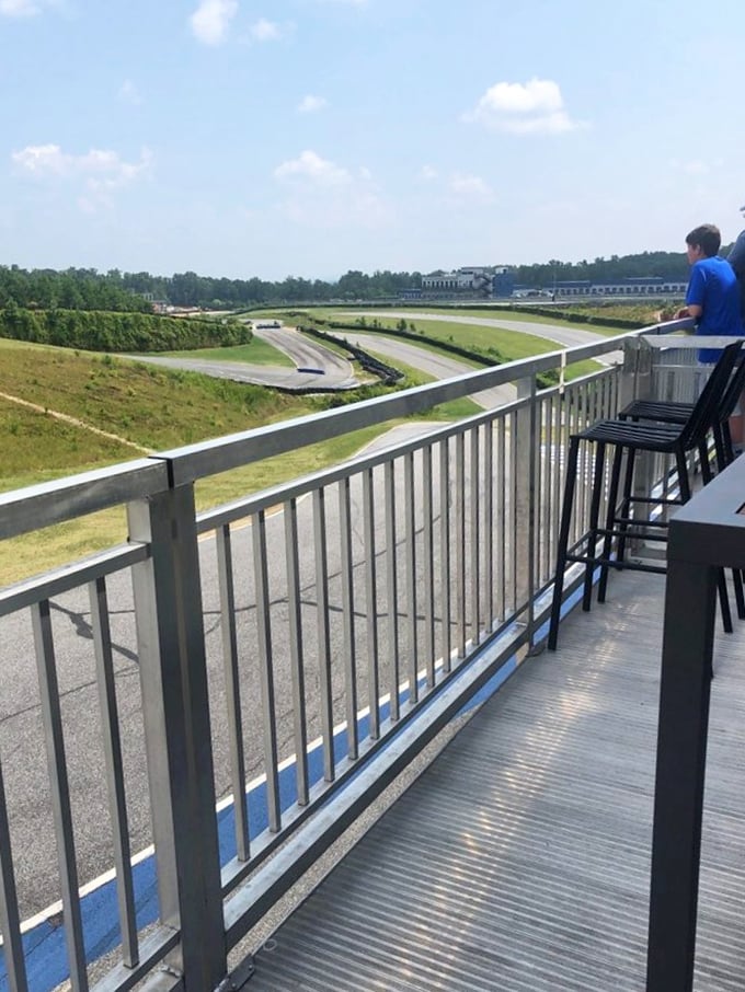 "Spectator sport redefined! From this balcony, you're close enough to taste the excitement (and maybe some rubber)."