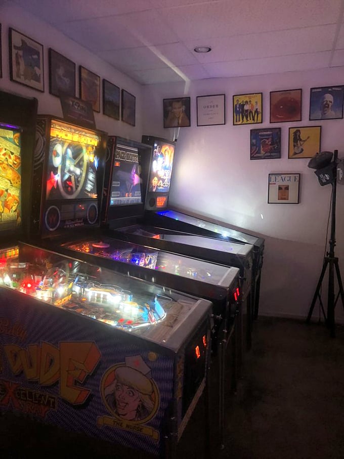 Wall art that speaks volumes: each poster a time capsule, each frame a window into gaming's golden age. It's like a museum, but way more fun.