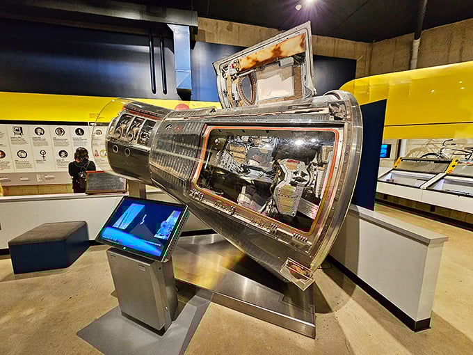 "Talk about a tight squeeze! No wonder astronauts skip the in-flight meal." Armstrong's Gemini capsule gives visitors a claustrophobic glimpse into the realities of space travel.