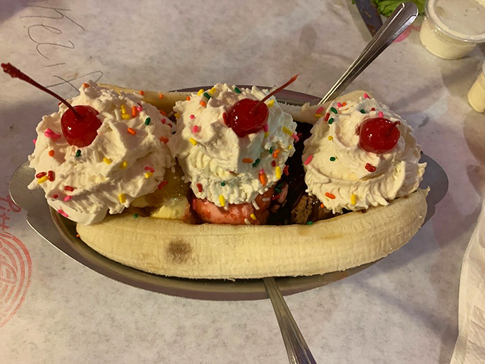 Holy split, Batman! This banana boat is sailing straight into dessert heaven, topped with more cream than Elvis had in his coffee.