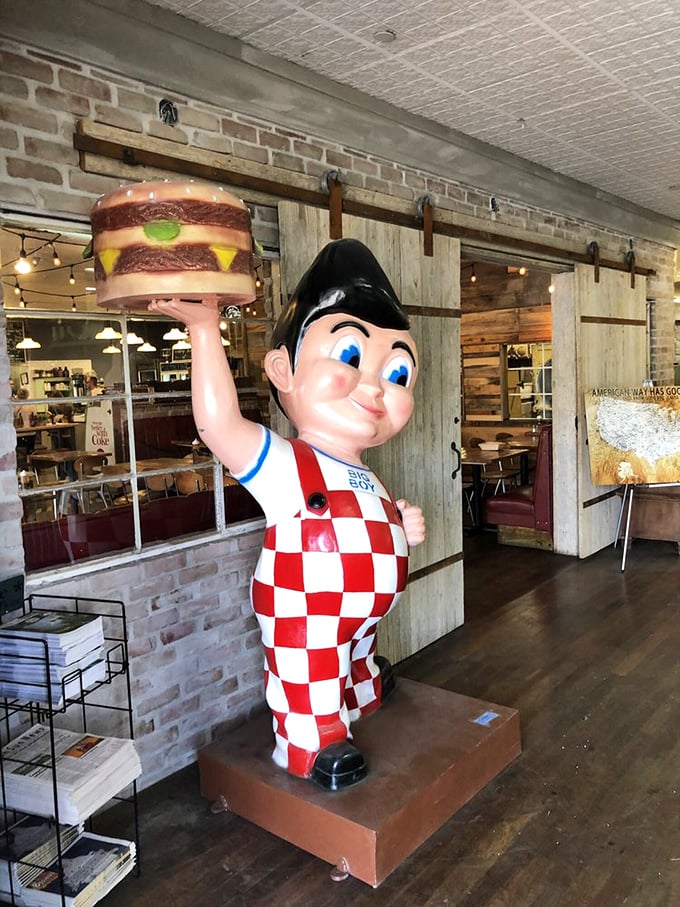 Holy smokes! This BBQ joint's mascot is serving up some serious nostalgia. I'll have what he's having, please!