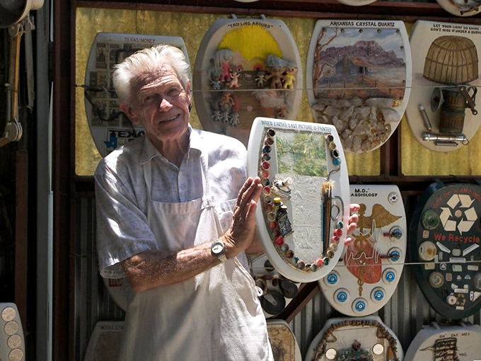 The maestro himself, surrounded by his life's work. Barney Smith proves that true passion knows no bounds &ndash; or bathroom boundaries.
