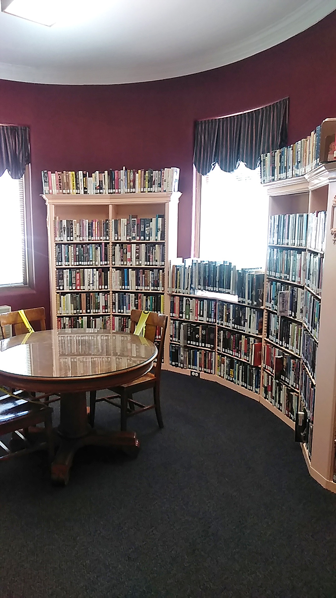Curved bookshelves that would make any librarian swoon. It's like a literary hug in architectural form.