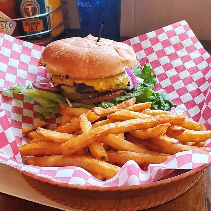 Burger paradise found! This juicy masterpiece and its crispy sidekick are proof that sometimes, the simple things in life are the most extraordinary.