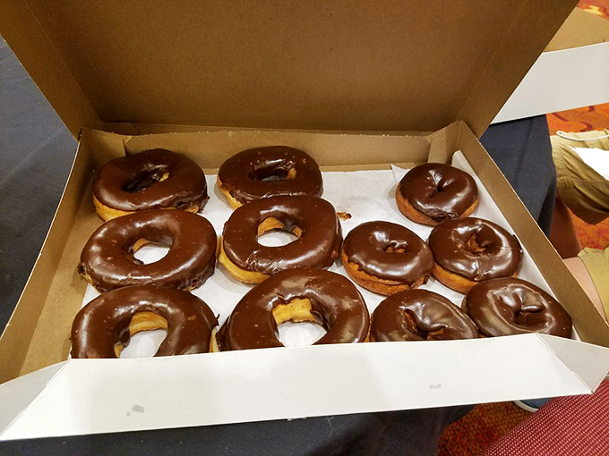 Chocolate lovers, rejoice! These donuts are wearing their formal wear - a glossy coat of chocolate that's dressed to impress your palate.