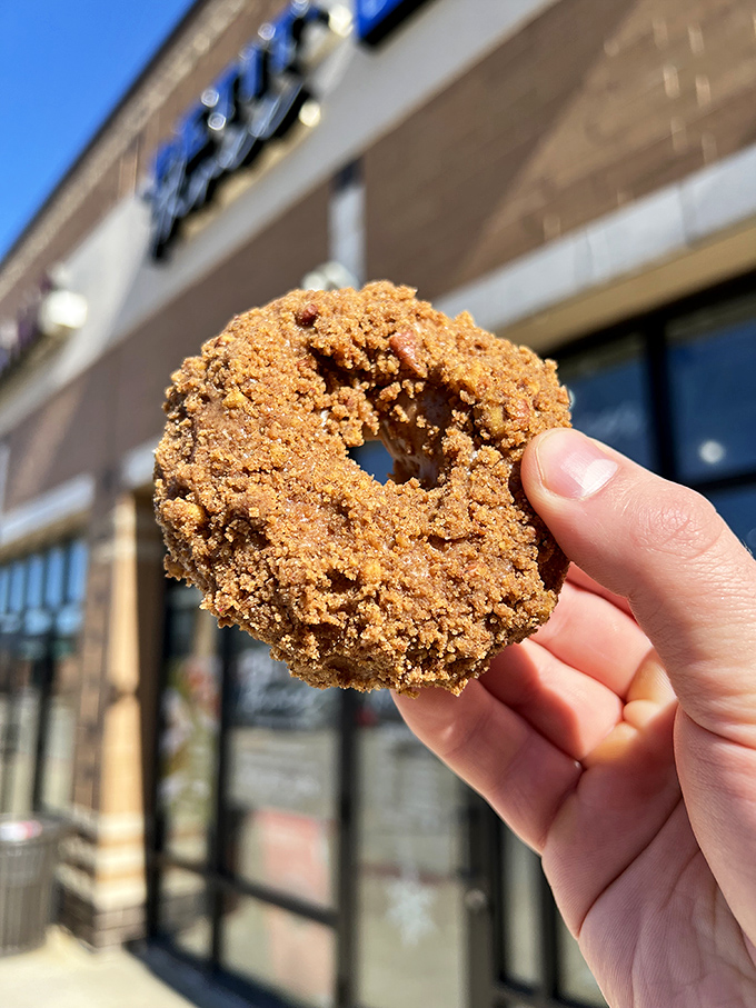 Behold, the cinnamon cake donut! This golden-brown beauty is like a warm hug for your taste buds. Resistance is futile!