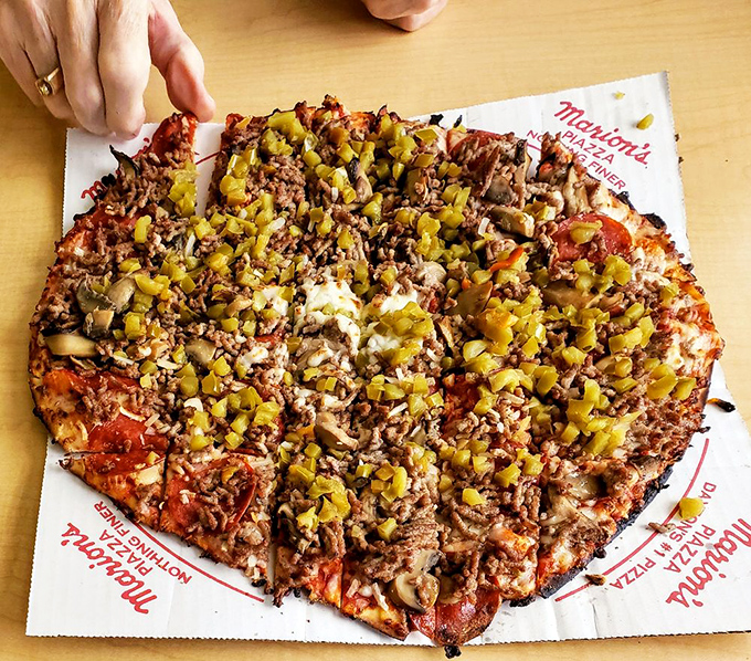 The Deluxe: where every topping is the star! It's like the Avengers of pizzas &ndash; each bite a superhero team-up of flavors.