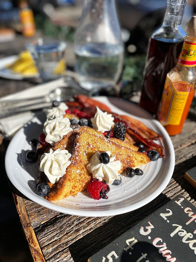 Behold the Belgian waffle's cooler cousin: JoJo's French toast. Crispy, custardy, and topped with enough whipped cream to make a cloud jealous.