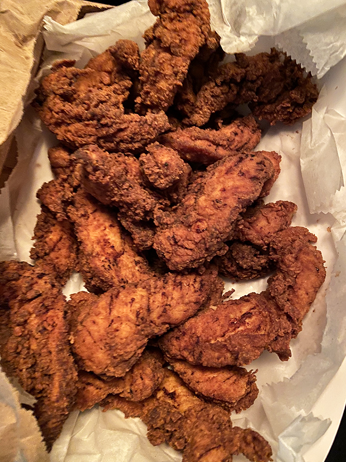 Fried chicken nirvana! This mountain of crispy goodness is like a warm, comforting hug for your taste buds. Napkins required, restraint optional.