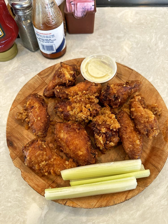 Garlic wings that could ward off vampires and boring meals alike. These crispy delights are a garlic lover's dream come true.