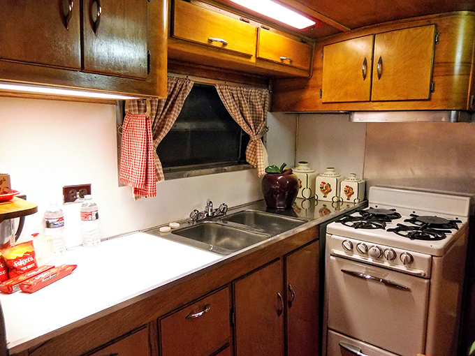 This kitchen might be compact, but it's got more mid-century charm than a marathon of "I Love Lucy." Just don't expect to find any avocado toast here!
