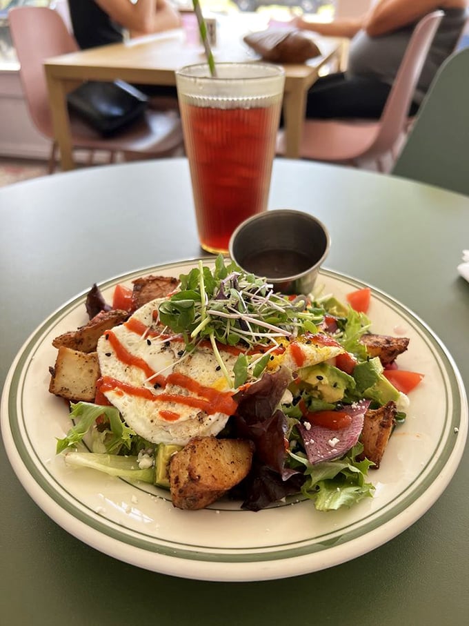 The Kitchen Sink Salad: Proof that "healthy" and "delicious" can be best friends. It's like a garden party in your mouth!