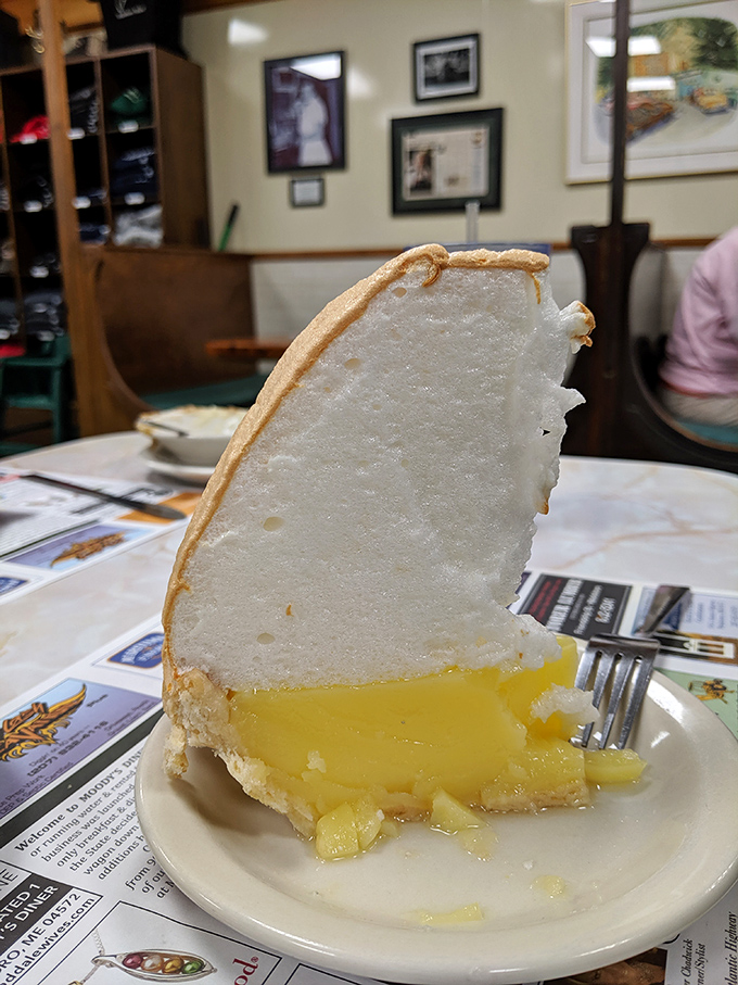 Lemon meringue pie reaching new heights! This slice could give the Matterhorn a run for its money in both altitude and deliciousness.