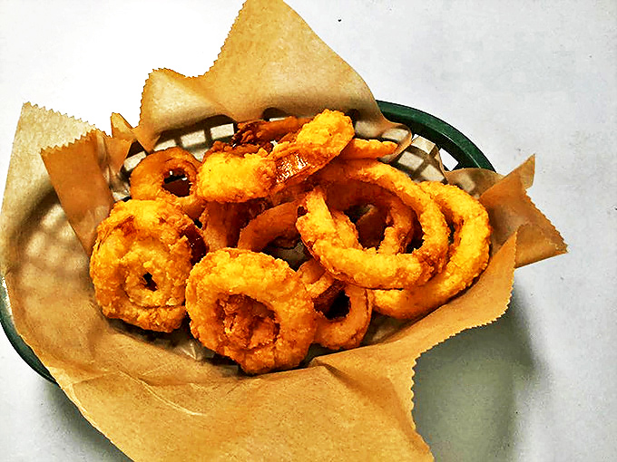 "The ultimate comfort food sidekick!" These golden onion rings are like edible jewelry – deliciously accessorizing your meal with each crunchy bite.