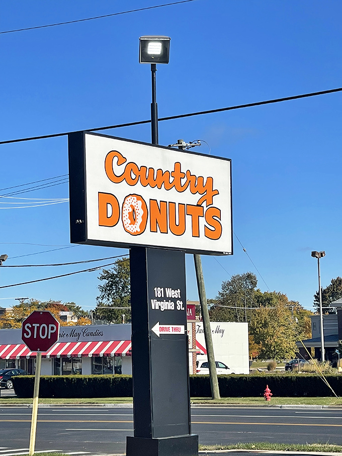 The bat signal for donut lovers! This sign is a beacon of hope for anyone with a sweet tooth and a dream.